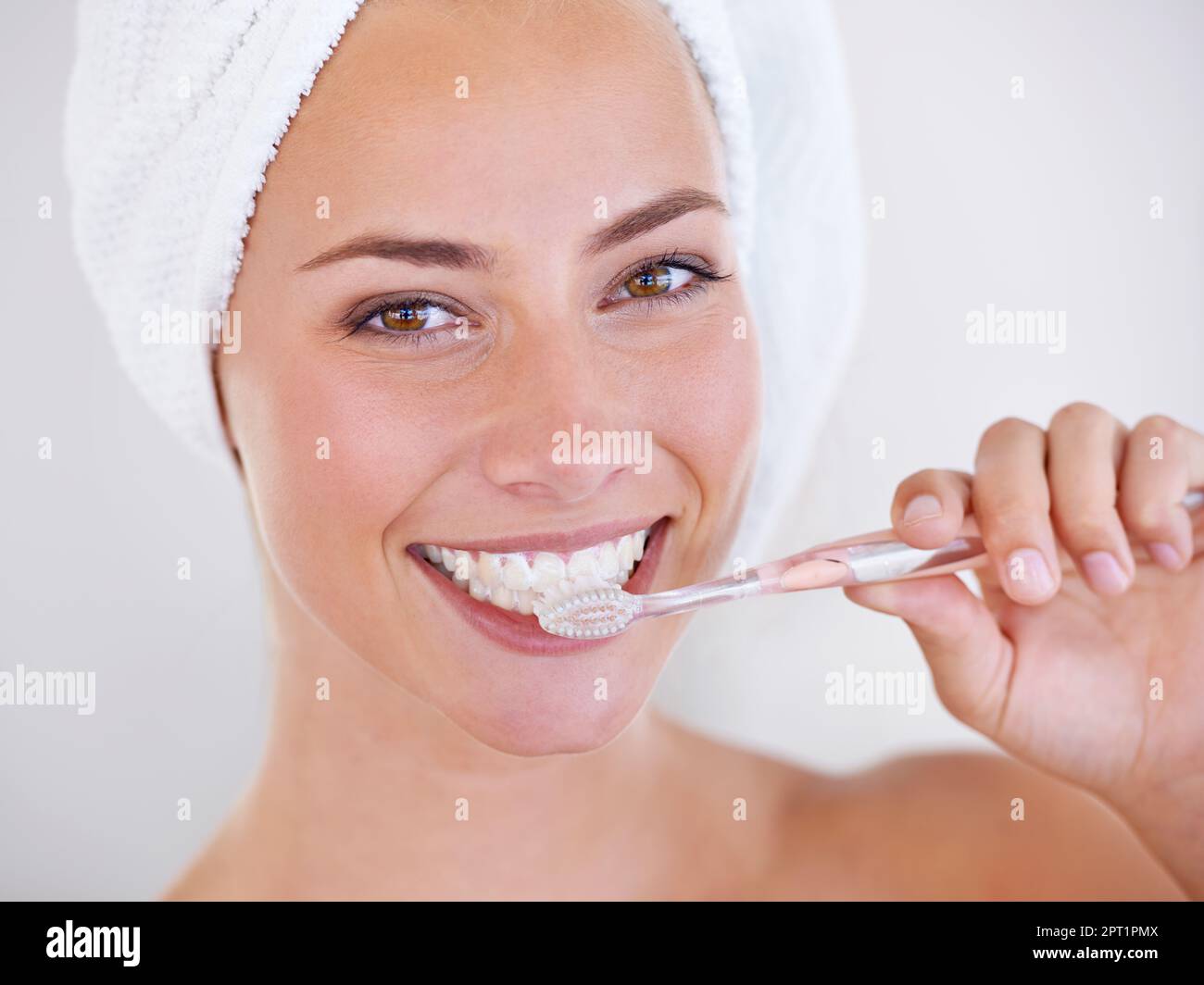 Keeping her gorgeous smile maintained. Close up of a pretty lady ...