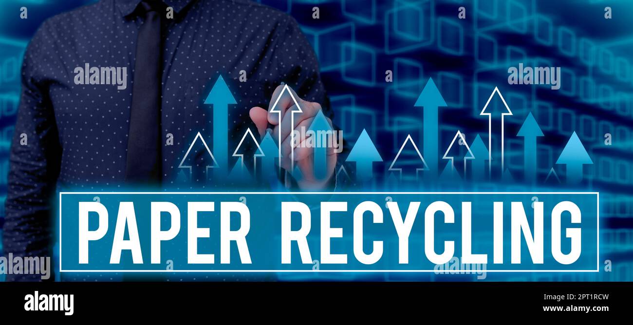 Hand writing sign Paper RecyclingUsing the waste papers in a new way by ...