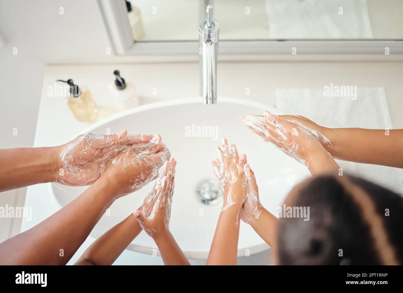 Teach child how to wash hand hi-res stock photography and images - Alamy