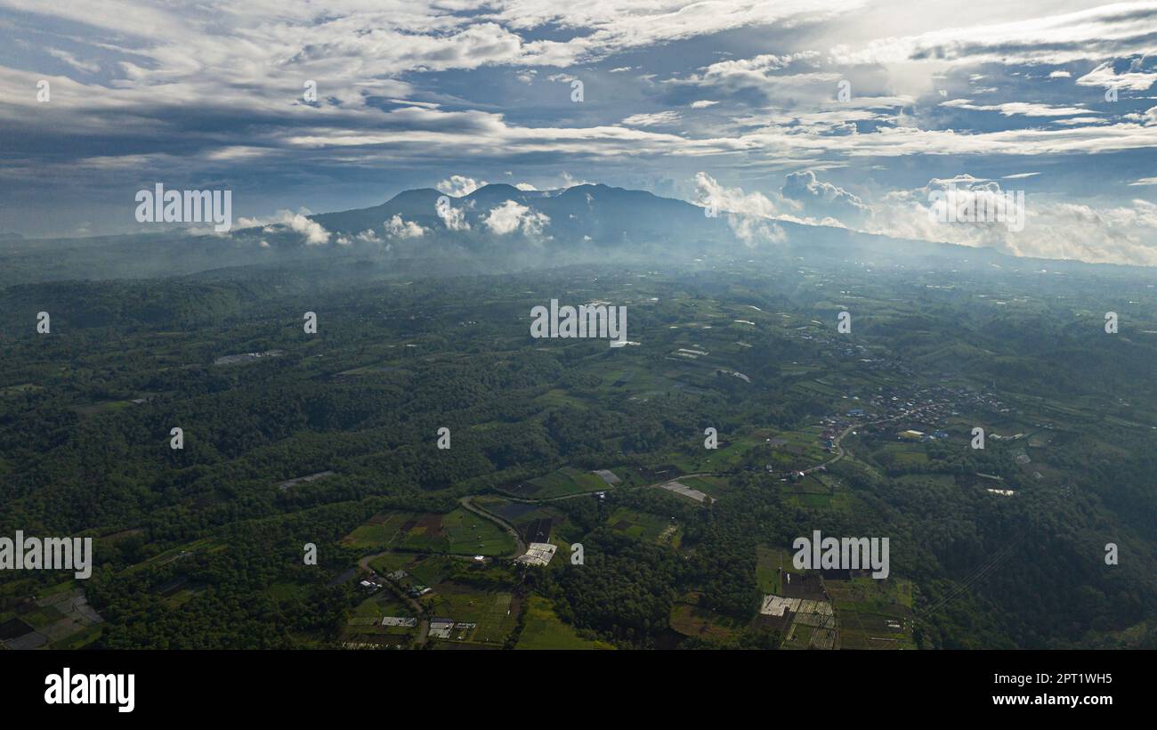 Mountains and farmland in the tropics view from above. Sumatra ...