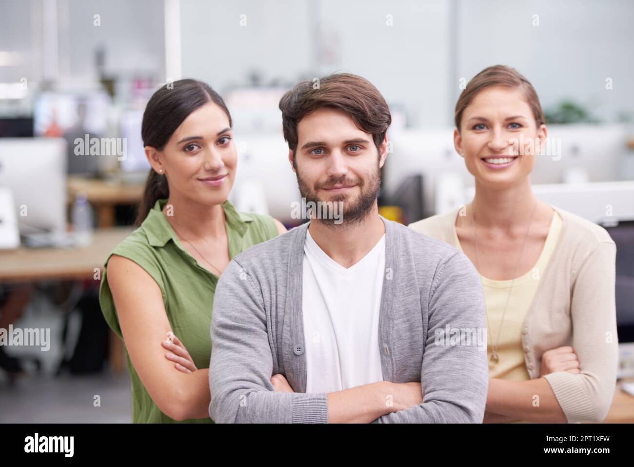 Were the best in our business. three work colleagues in the office ...
