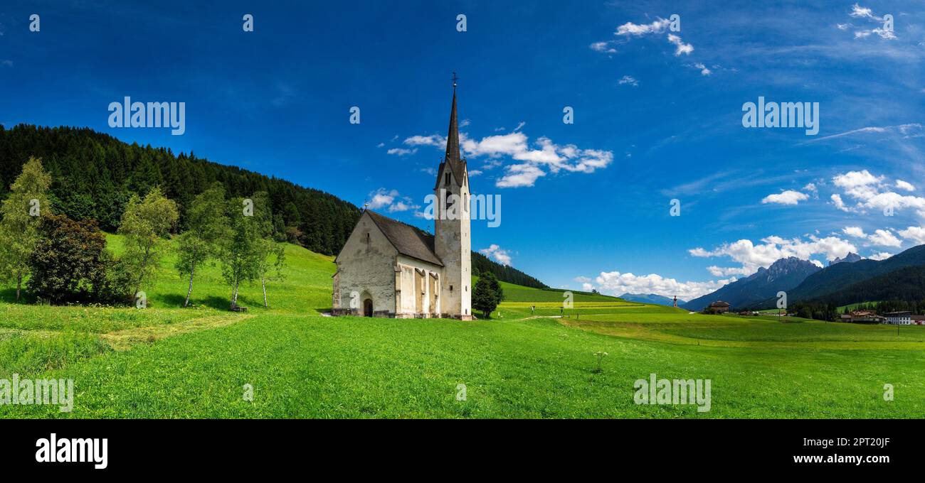 Panorama of the Saint Magdalina church near Villabassa in the Italian ...