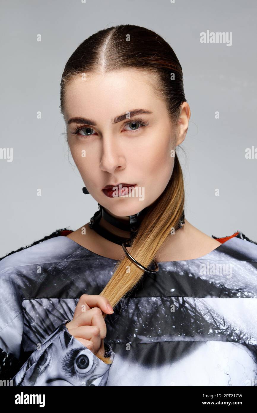 Closeup portrait of fashion model with perfect skin, dark matt lipstick ...