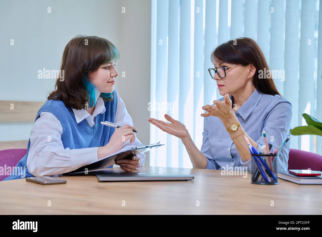 Student interviewing teacher hi-res stock photography and images - Alamy