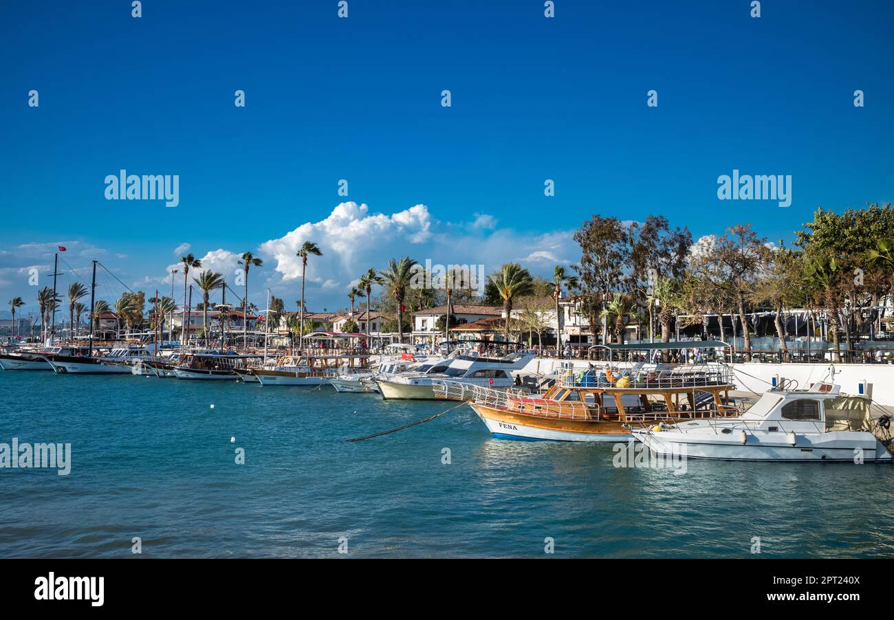 Pleasure boats moored at the quayside in the harbour at the Old Town of ...