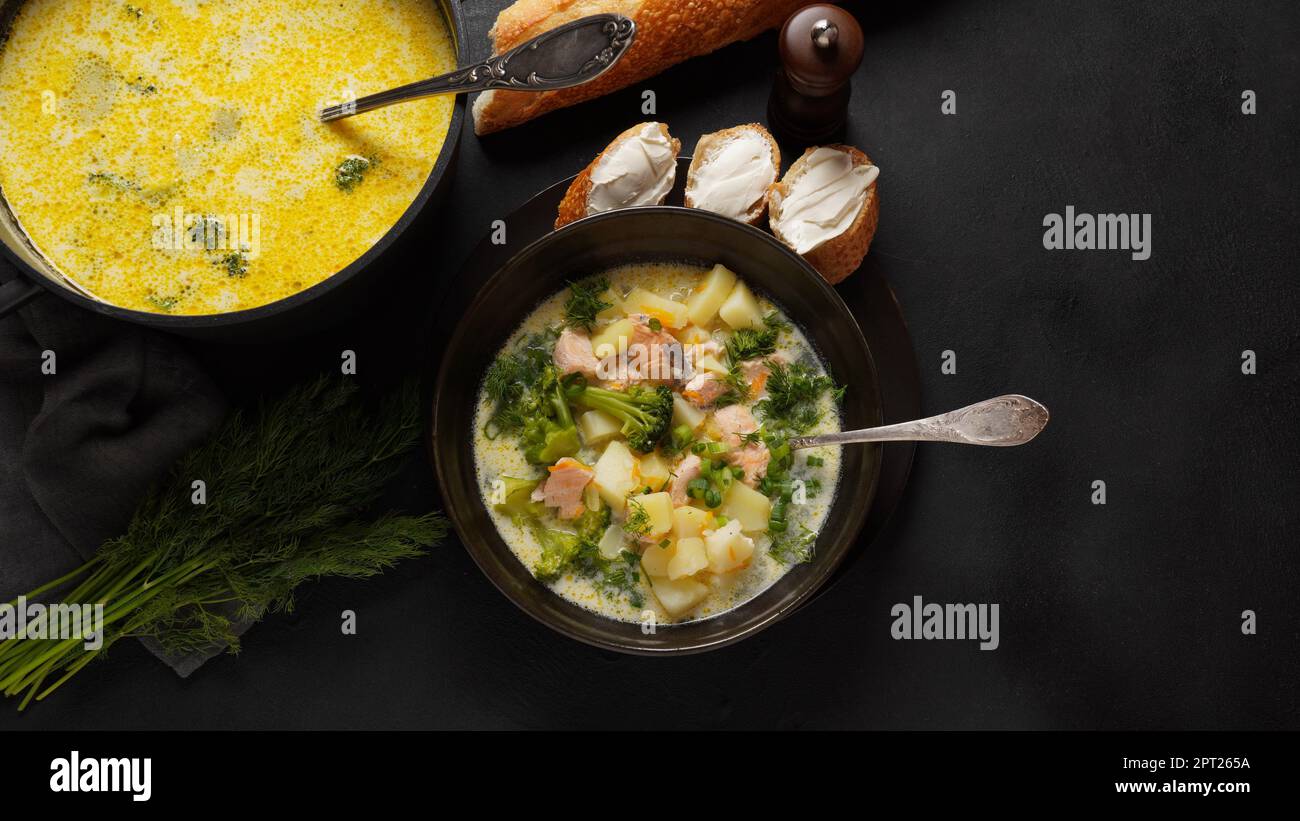 Creamy fish soup with salmon, potatoes, onions , carrots, dill and ...