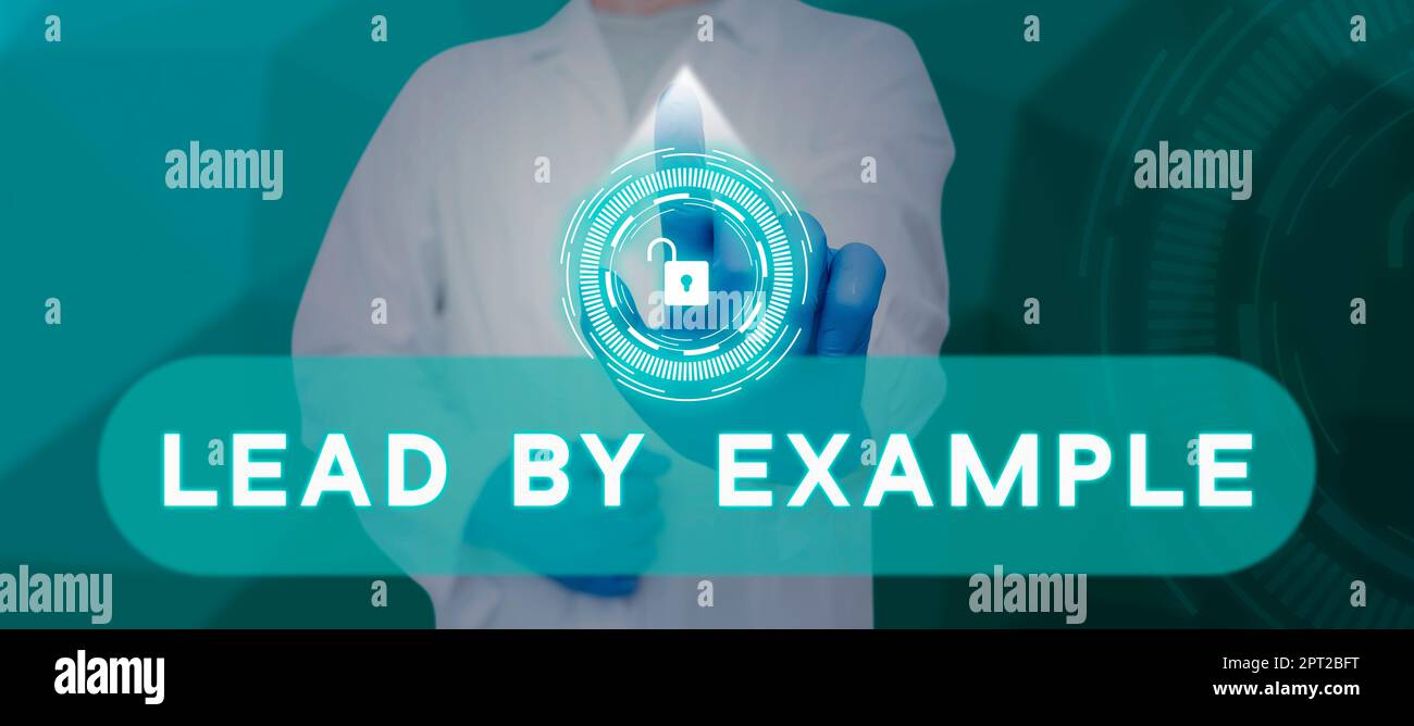 Hand writing sign Lead By Example, Business showcase Be a mentor leader ...