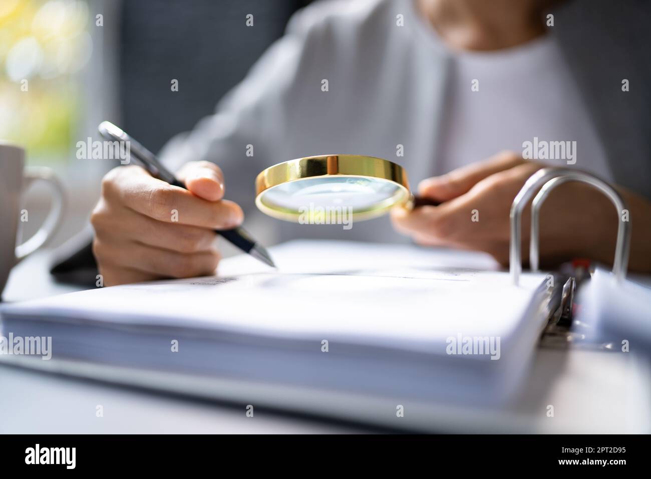 Auditor Using Magnifying Glass For Audit And Fraud Investigation Stock ...