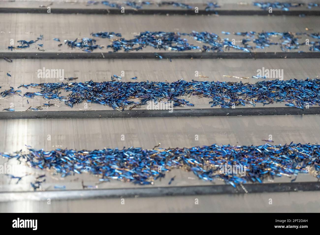 Machine scrap on CNC machine or turning machine Stock Photo - Alamy