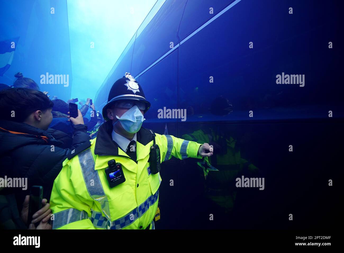 The Everton team bus arrives as police keep an eye on Everton fans with ...