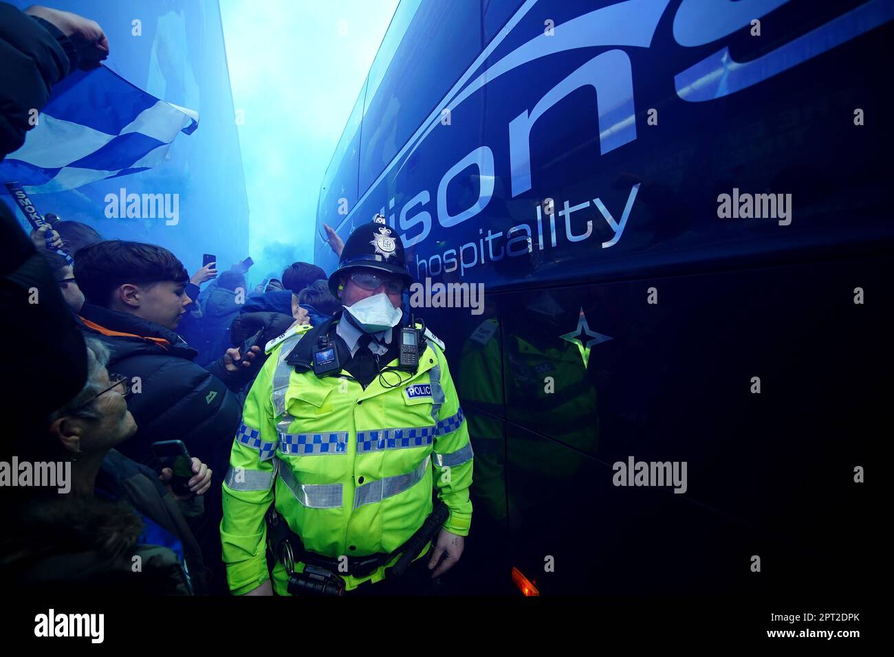 The Everton team bus arrives as police keep an eye on Everton fans with ...