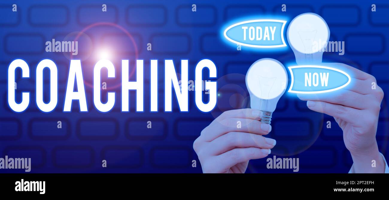 Inspiration showing sign Coaching, Concept meaning unlocking a persons ...
