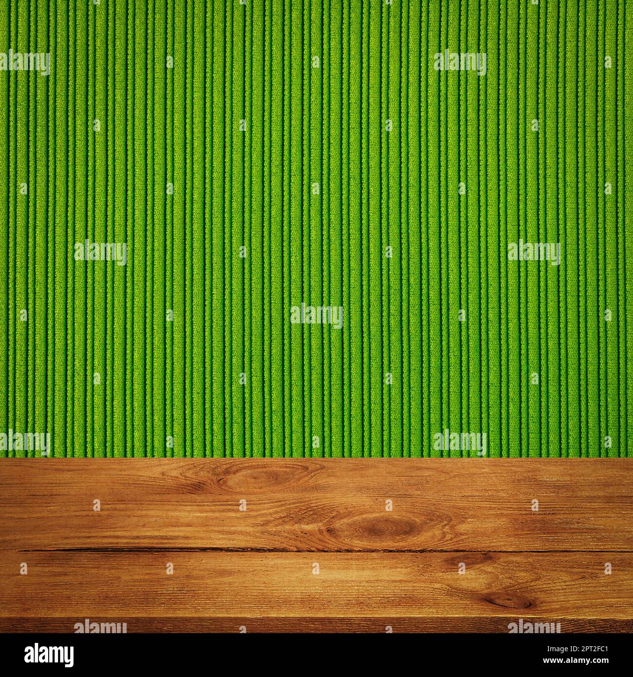 The background is blank wooden boards and a textured striped wall with ...