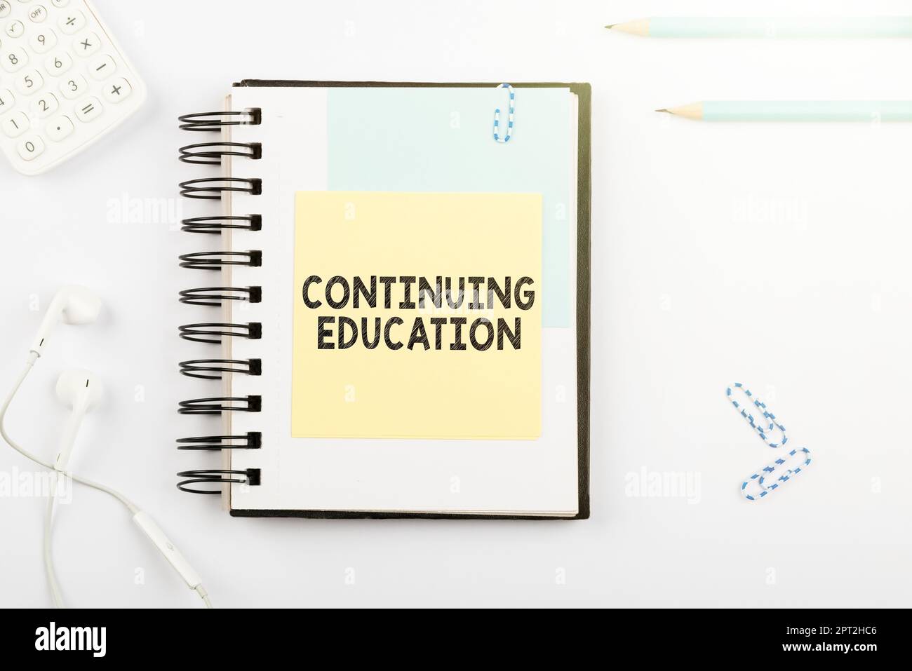 Sign displaying Continuing Education, Business overview Continued ...
