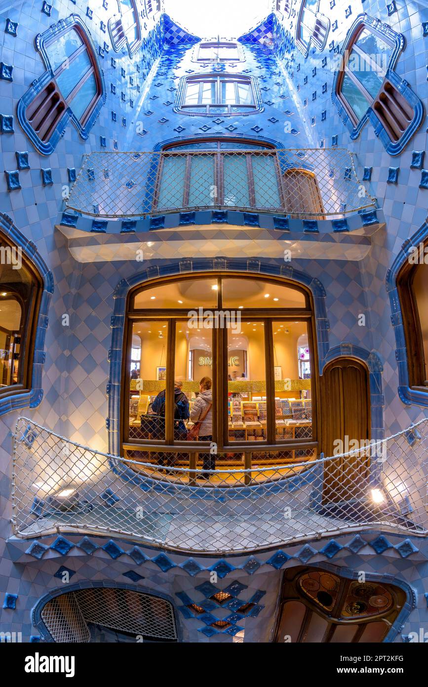 Inner courtyard of Casa Batlló decorated with a gradient mosaic from ...