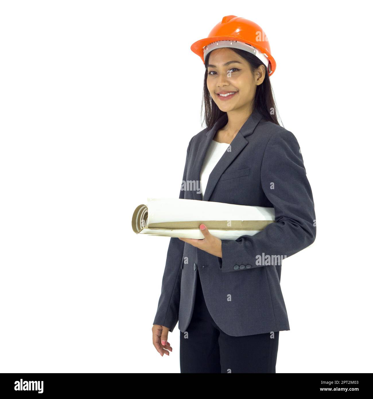 Young asian engineer in gray suit and orange hardhat stand smiling ...