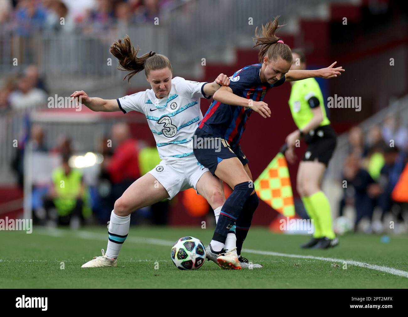 Chelsea's Niamh Charles (left) and Barcelona's Caroline Graham Hansen ...