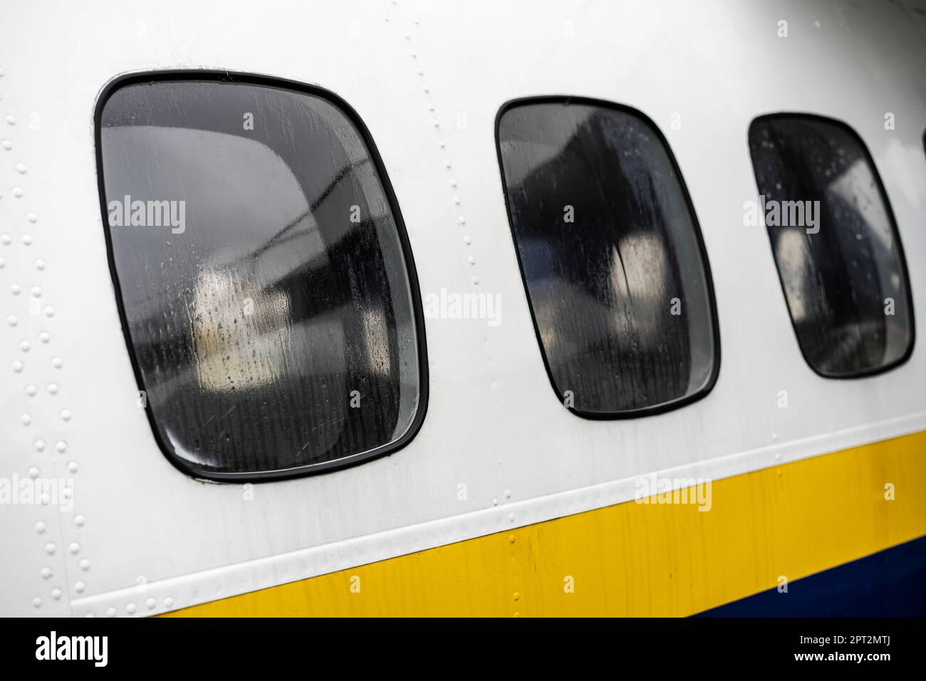 Airplane windows from the outside, at the airport Stock Photo - Alamy