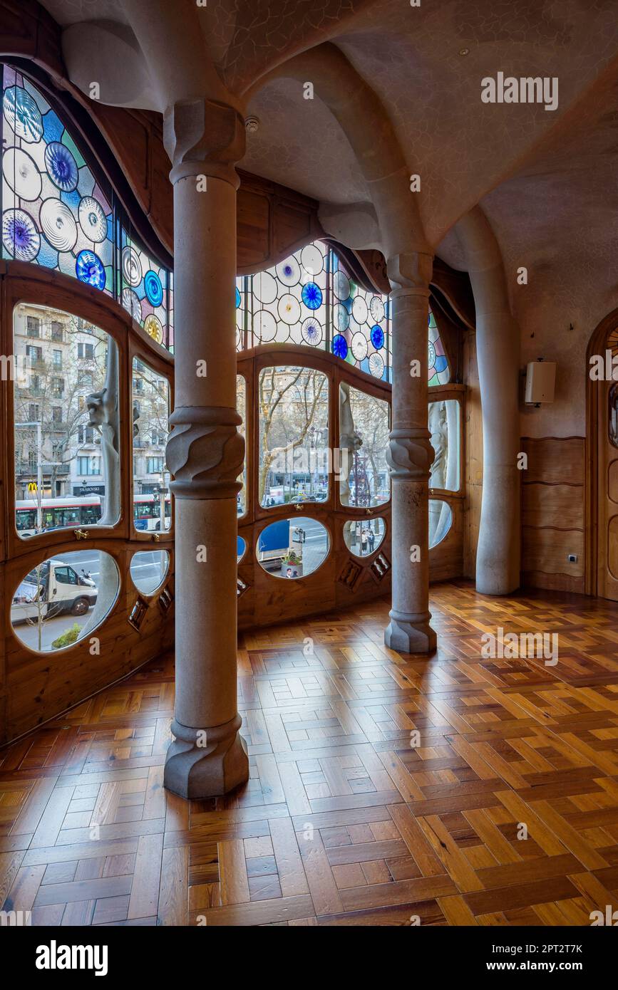 Large window with stained glass windows and columns in the main hall of ...