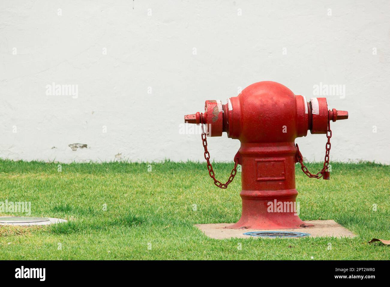 Fire extinguisher on the lawn For ease of use Stock Photo - Alamy