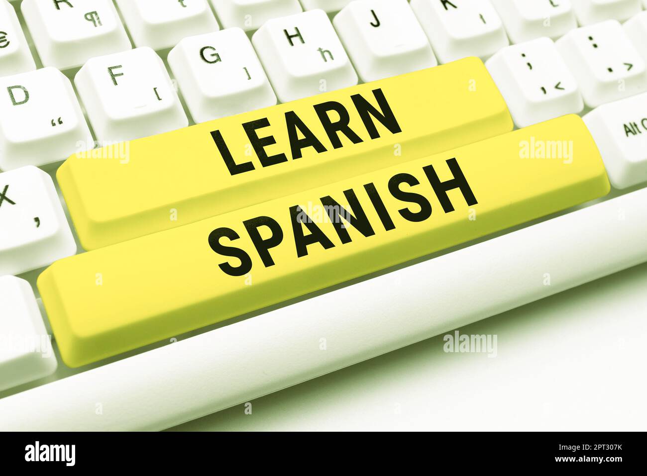 Hand writing sign Learn Spanish, Word Written on to train writing and ...