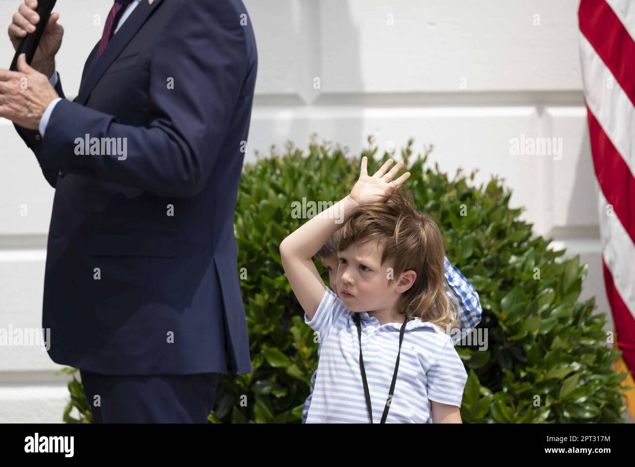 Washington, United States. 27th Apr, 2023. A kid waits to ask President ...