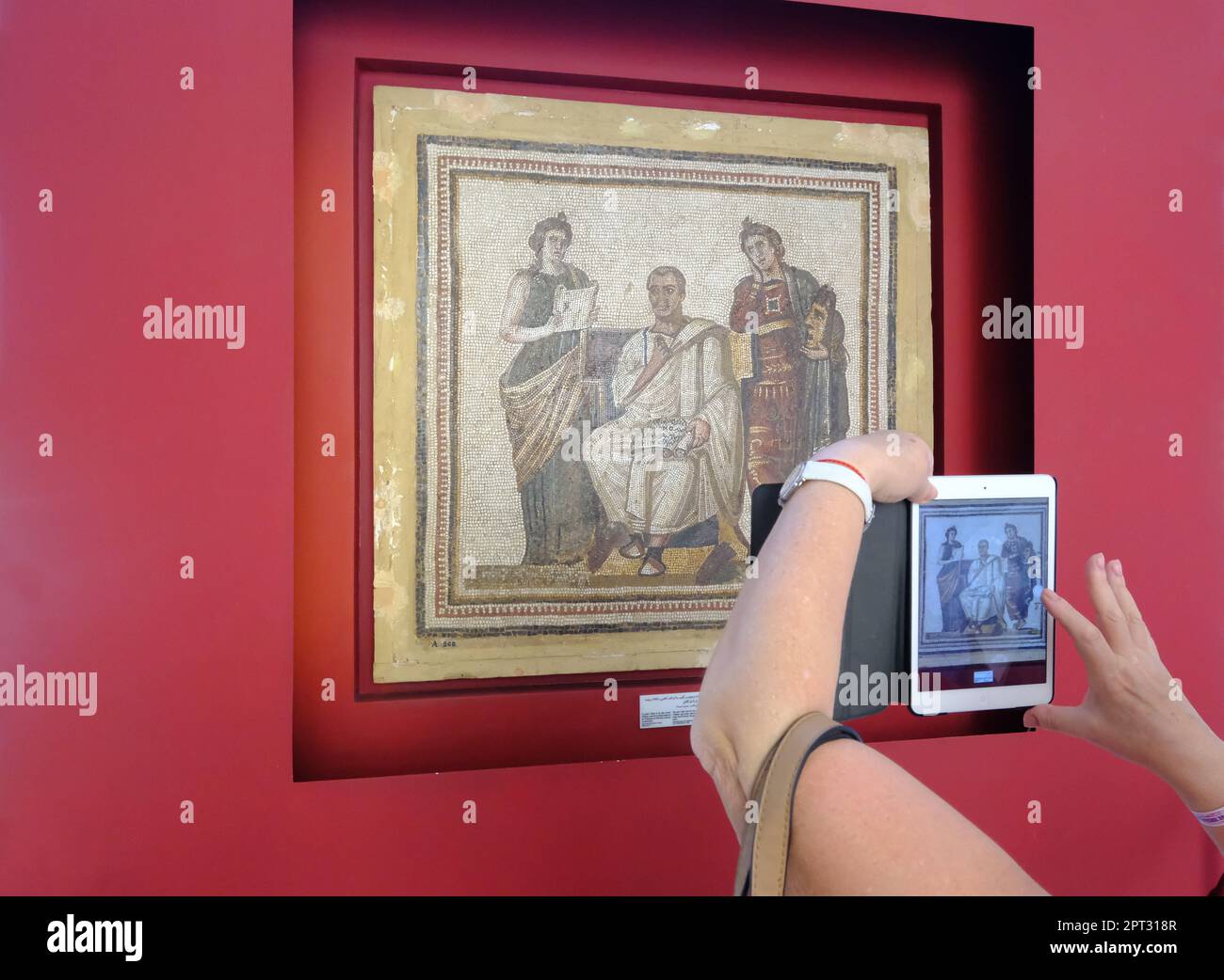 Woman take photo of Mosaic with the poet Virgil and the muses Calliope ...