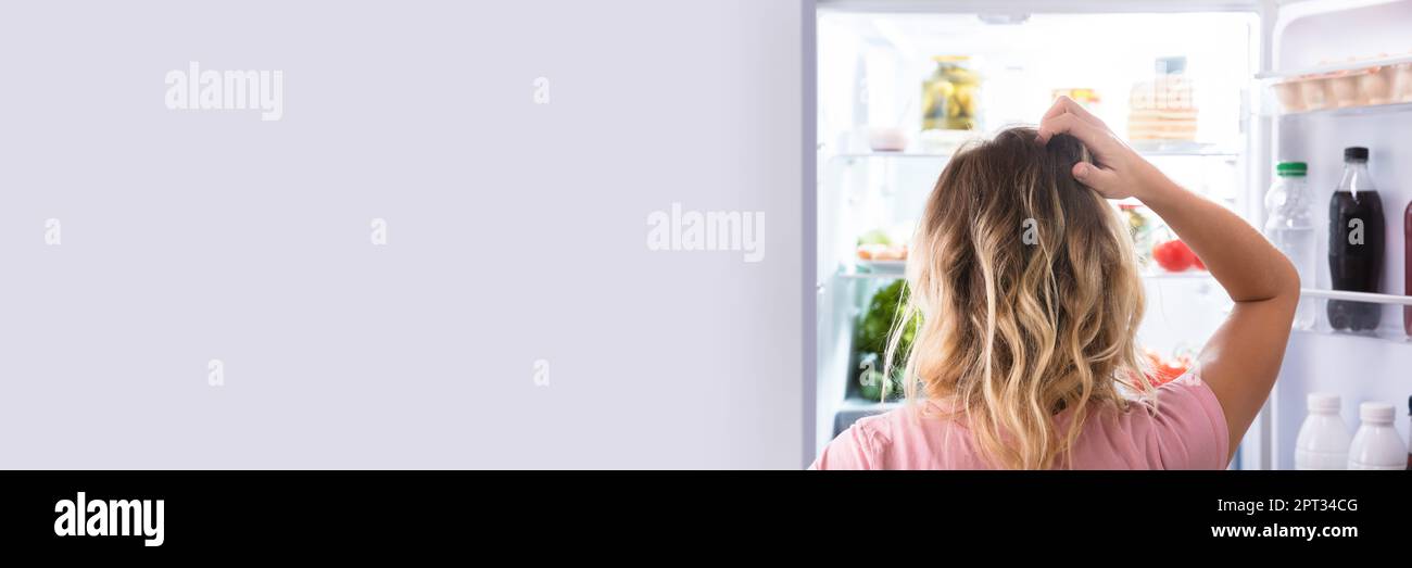 Look in the refrigerator hi-res stock photography and images - Alamy