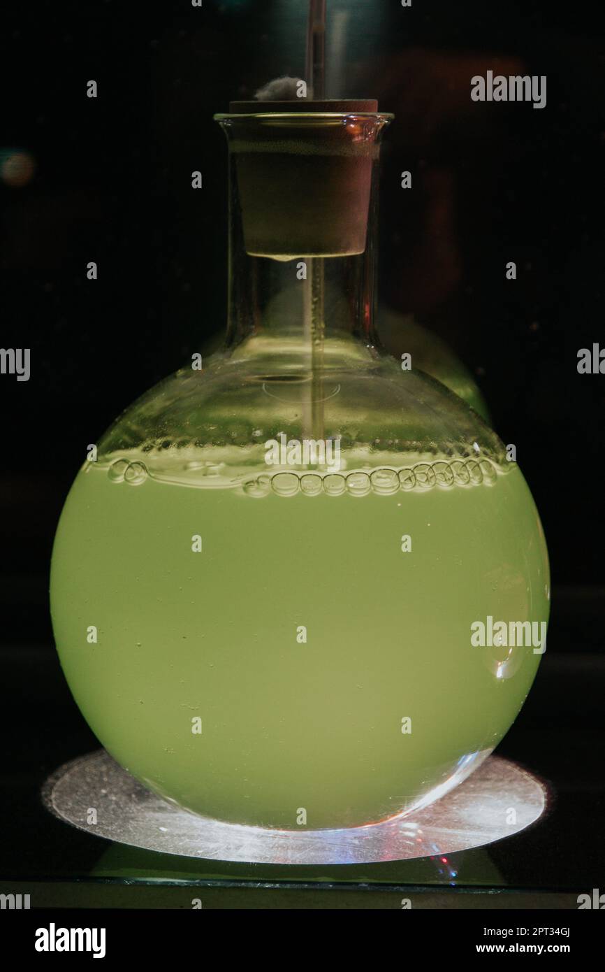 Round bottom laboratory flask isolated on black background Stock Photo ...