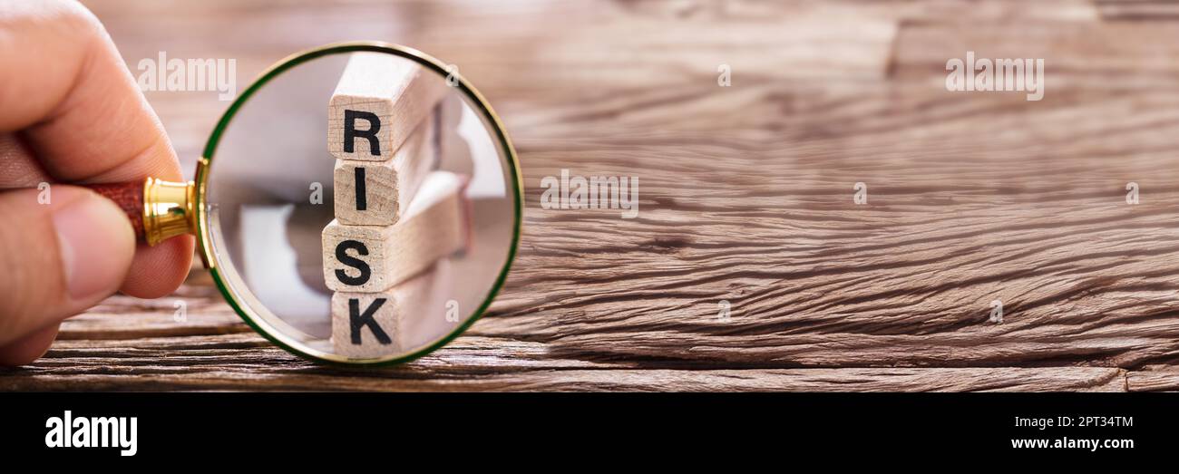 Strategic Risk Control And Magnifying Glass Concept Stock Photo - Alamy