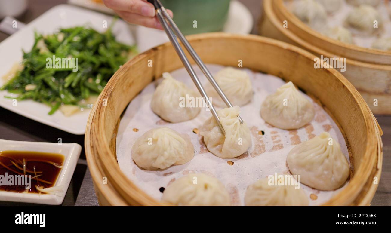 Chinese style steamed soup bun in restaurant Stock Photo - Alamy