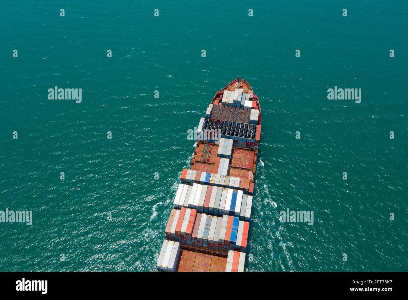 Aerial view of cargo ship Stock Photo - Alamy