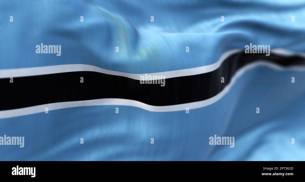Close-up view of the Botswana national flag waving in the wind. The Republic of Botswana is a ...