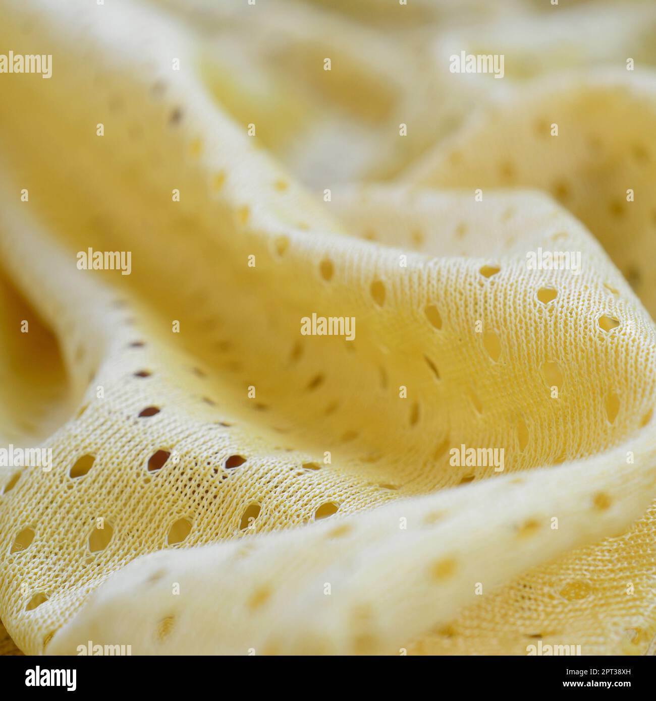 Yellow mesh sport wear fabric textile pattern background. Yellow color ...