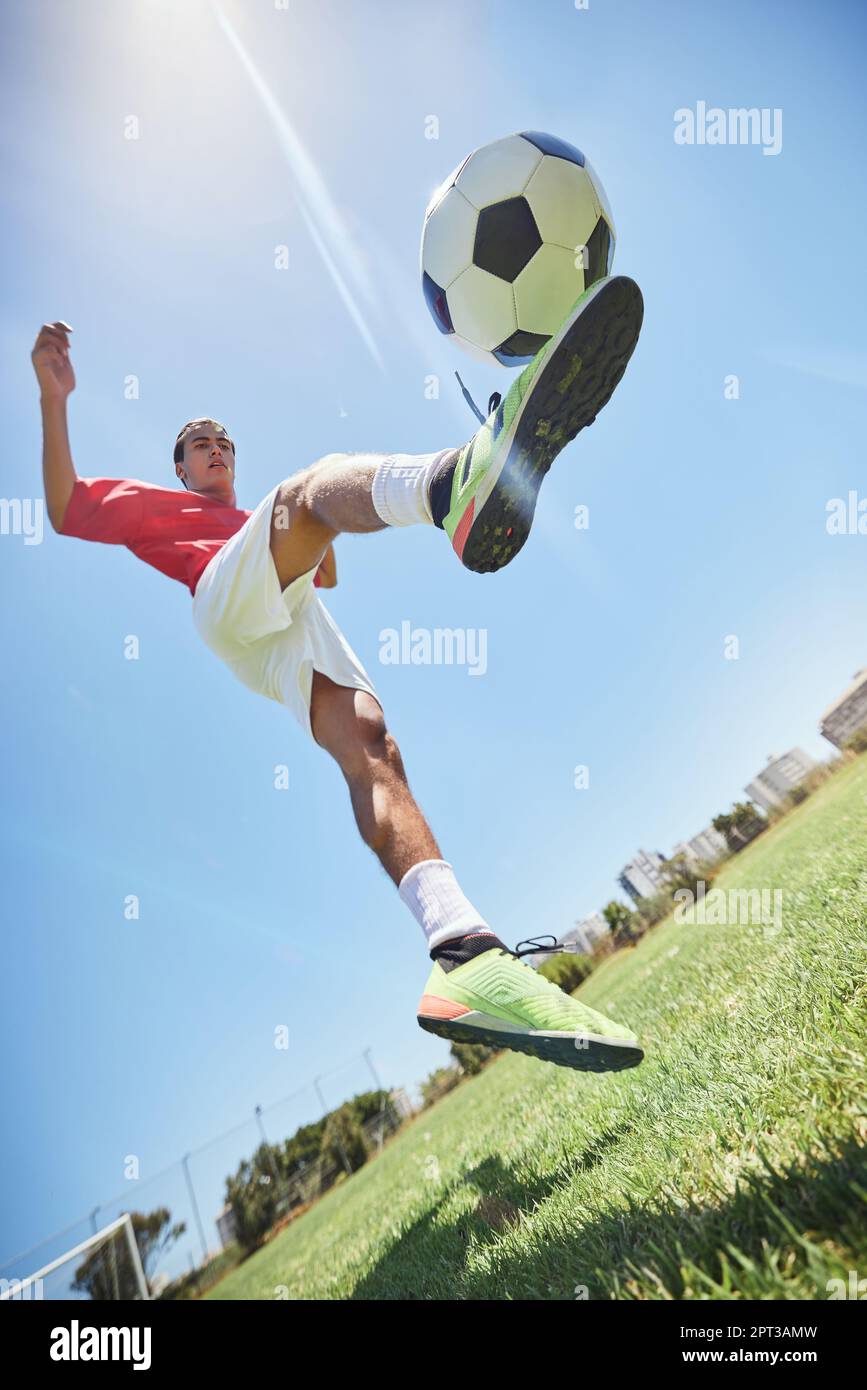 Football, fitness and soccer player training with a juggling exercise ...