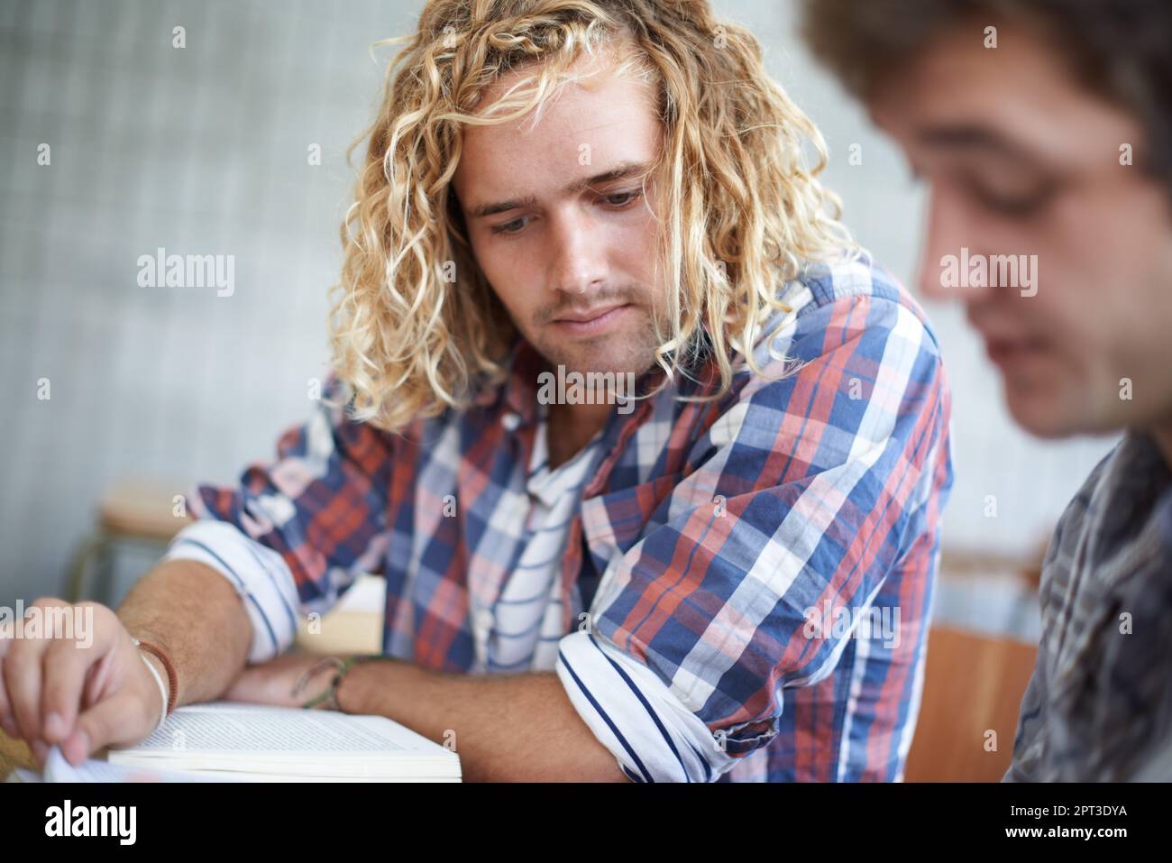 Seated male youth study hi-res stock photography and images - Alamy