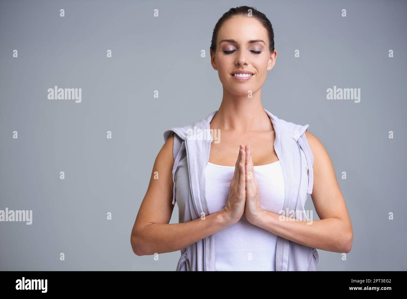 Feeling in control of her health and mind. An attractive young woman ...