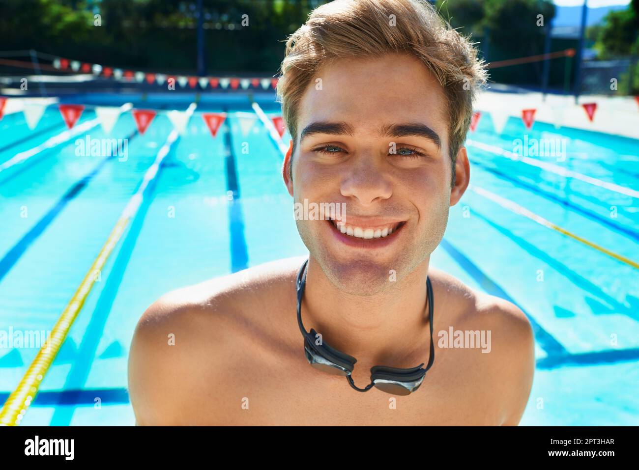 Man standing near swimming pool hi-res stock photography and images - Alamy