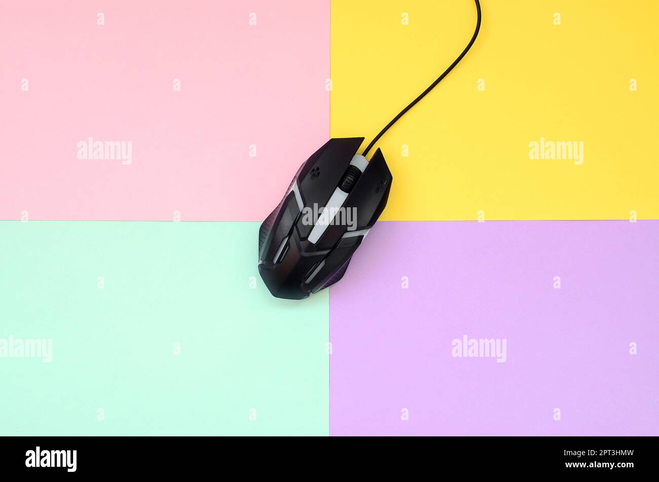 Optical gaming mouse is located between areas of different colors ...
