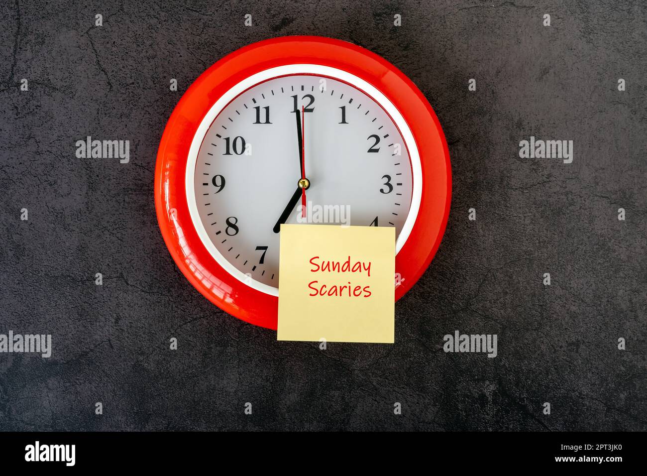 Sunday scaries text on adhesive note on top of clock Stock Photo - Alamy