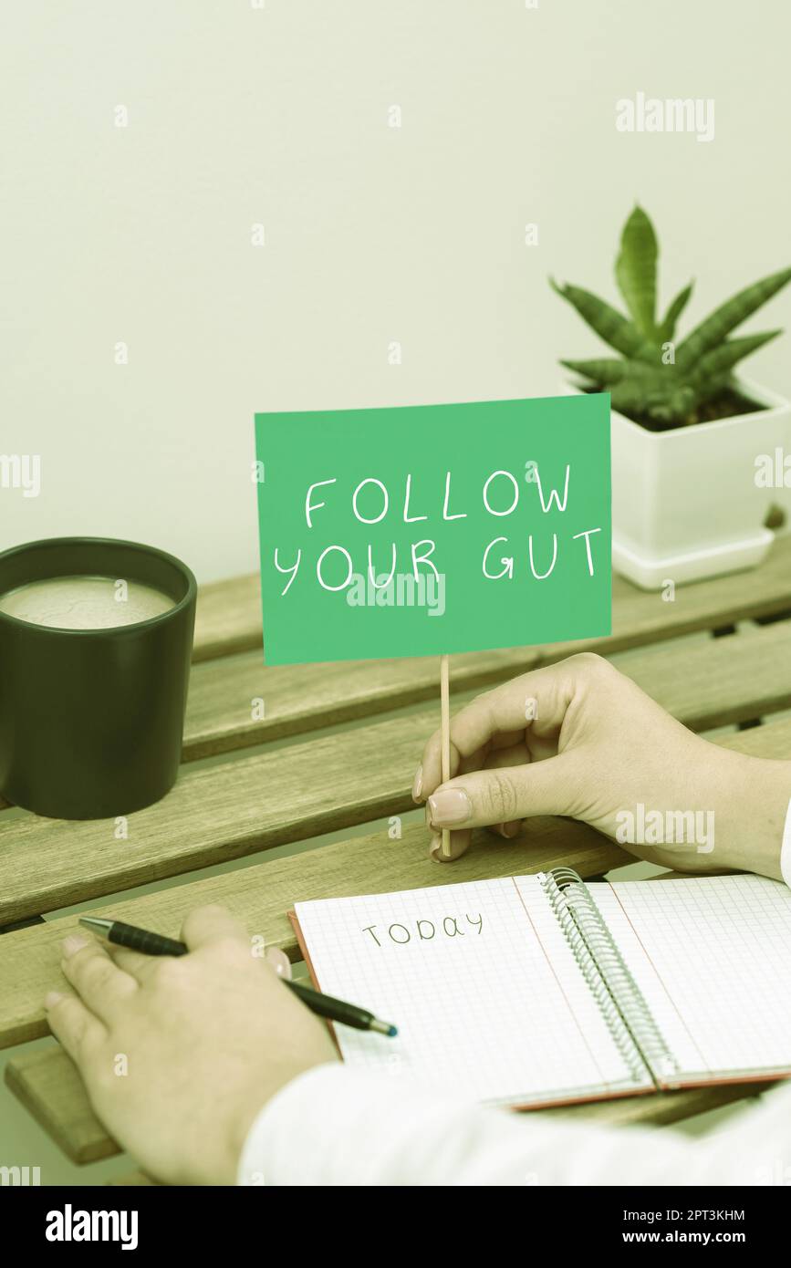 Text caption presenting Follow Your Gut, Word Written on Listen to ... Text caption presenting Follow Your Gut, Word Written on Listen to ...