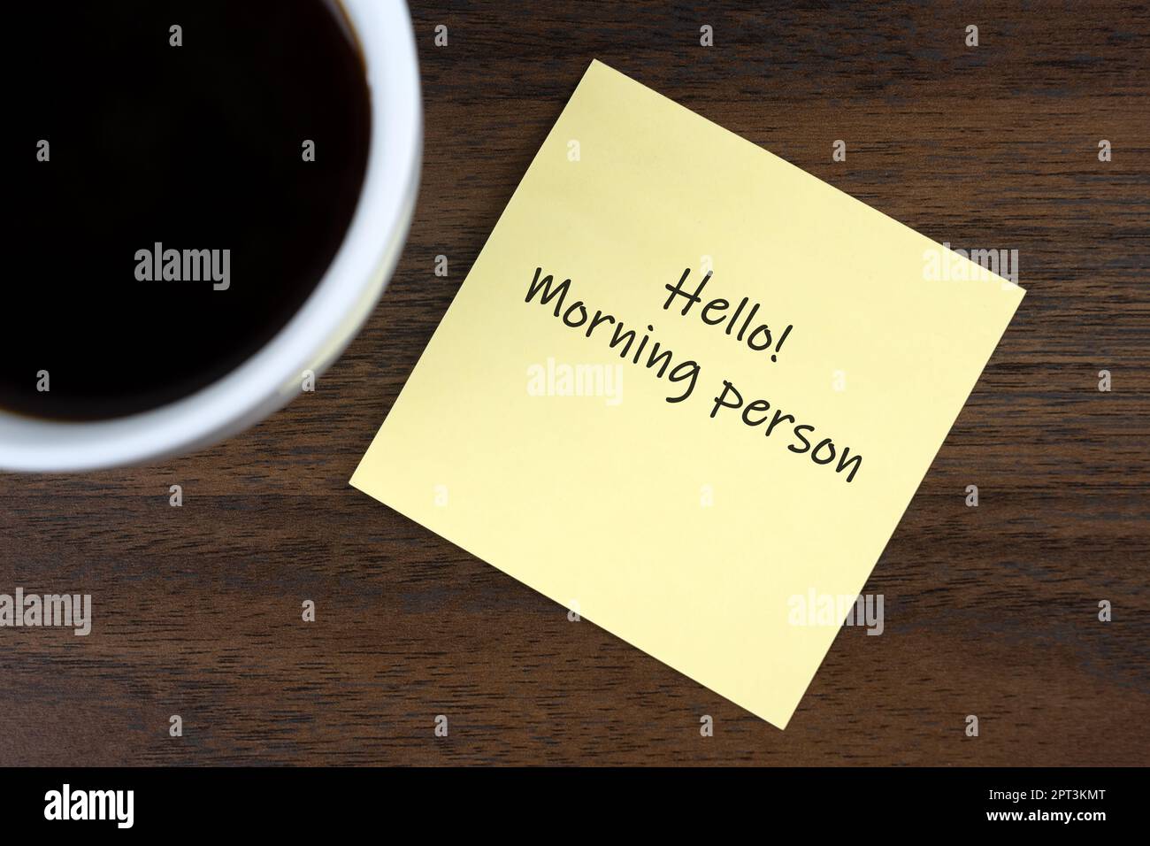 Hello Morning Person text on adhesive note with a cup of coffee Stock ...