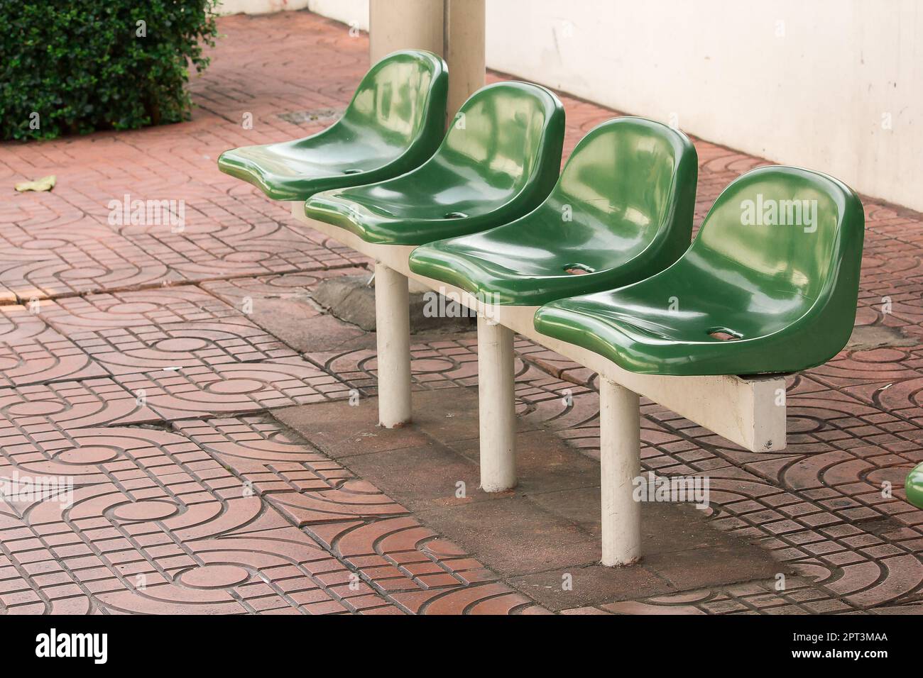 Green plastic chair at the bus stop For passengers waiting Stock Photo ...