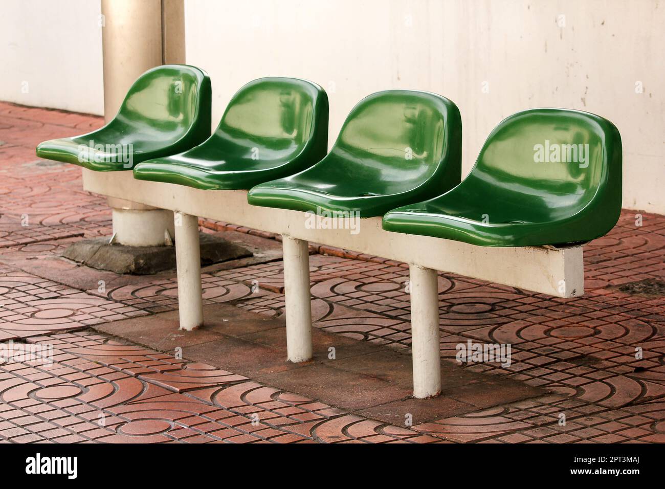 Green plastic chair at the bus stop For passengers waiting Stock Photo ...