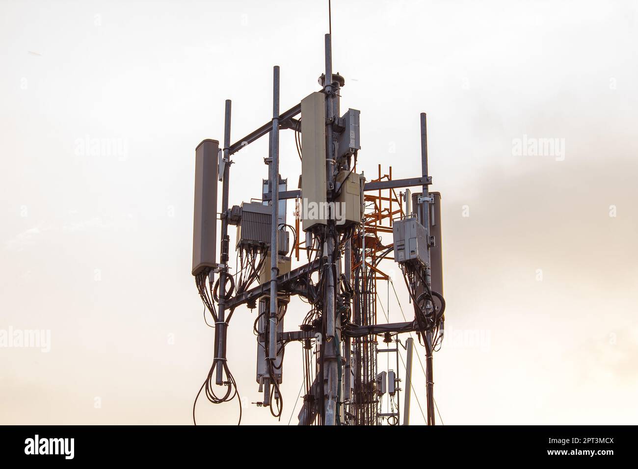 Panel Antenna installed on steel posts On high-rise buildings in the city Stock Photo - Alamy