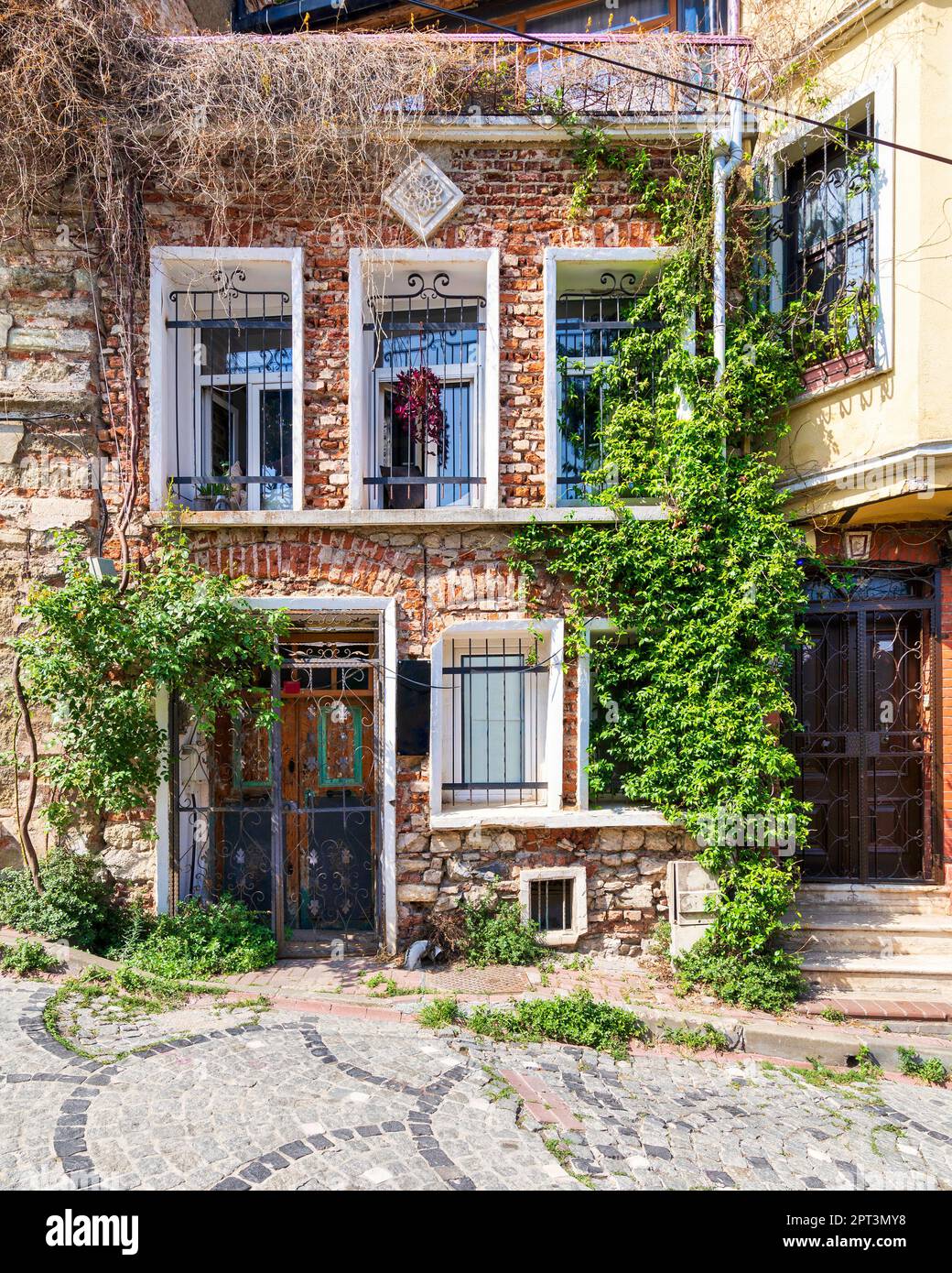 Beautiful old traditional red bricks houses in old Balat district, on a ...