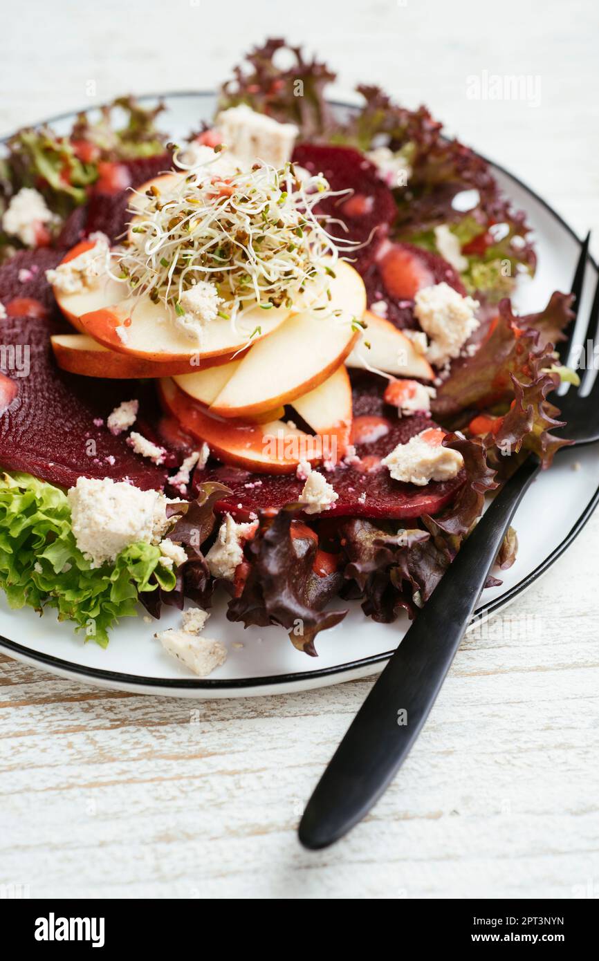 Beet and Apple Salad on mixed Greens with Strawberry Vinaigrette Stock ...