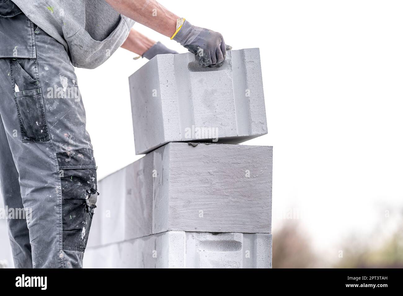 construction of a wall of a house made of concrete blocks Stock Photo ...