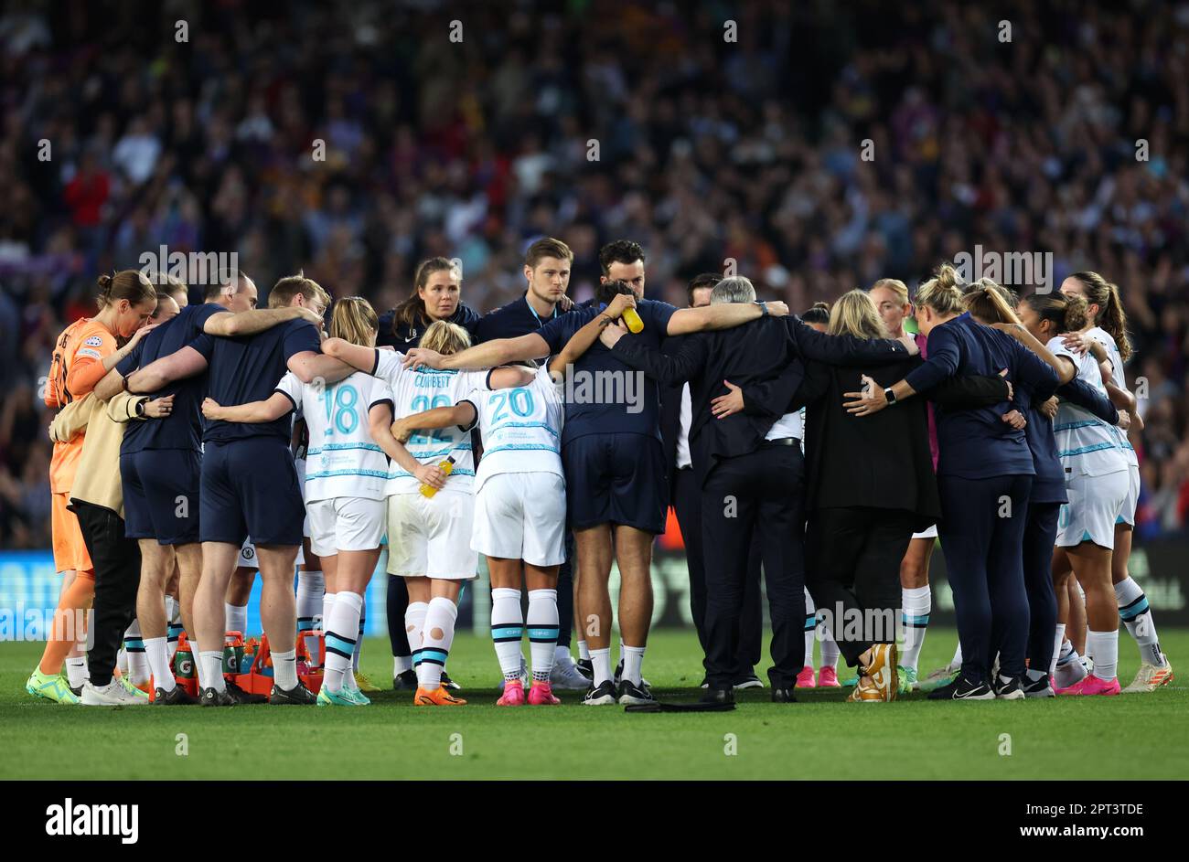 Chelsea players and staff in a group huddle after the UEFA Women's ...