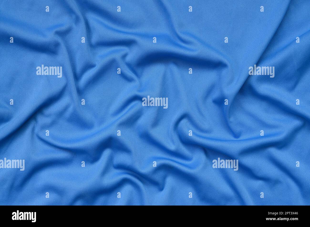 Detailed polyester blue fabric texture with many long folds Stock Photo ...